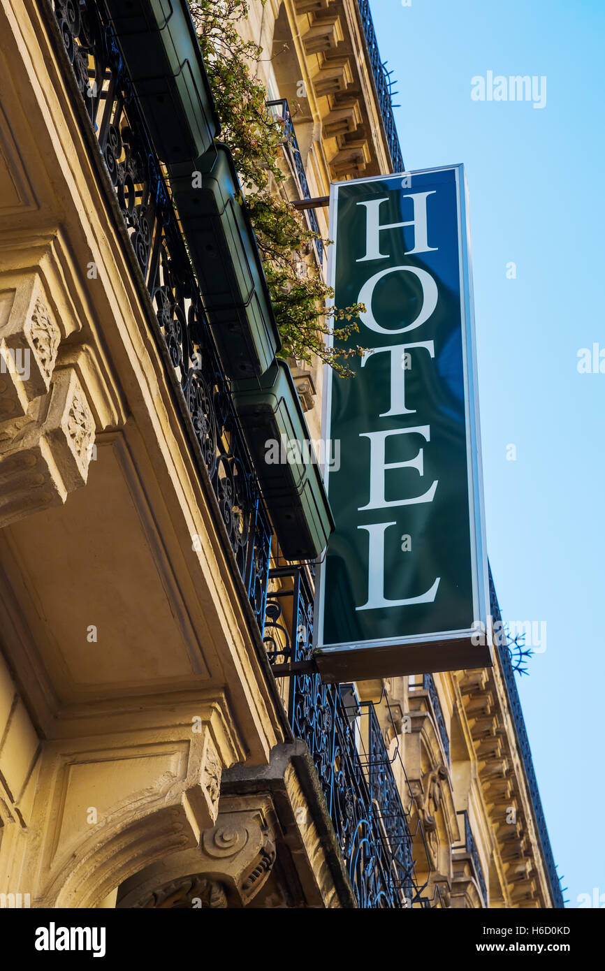 neon sign of a hotel at an old building Stock Photo - Alamy