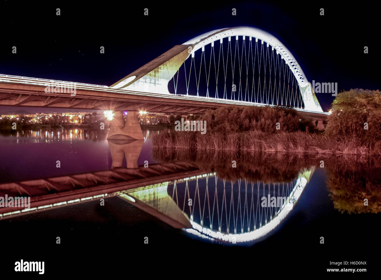 Lusitania bridge over Guadiana River at night, Merida, Spain Stock ...