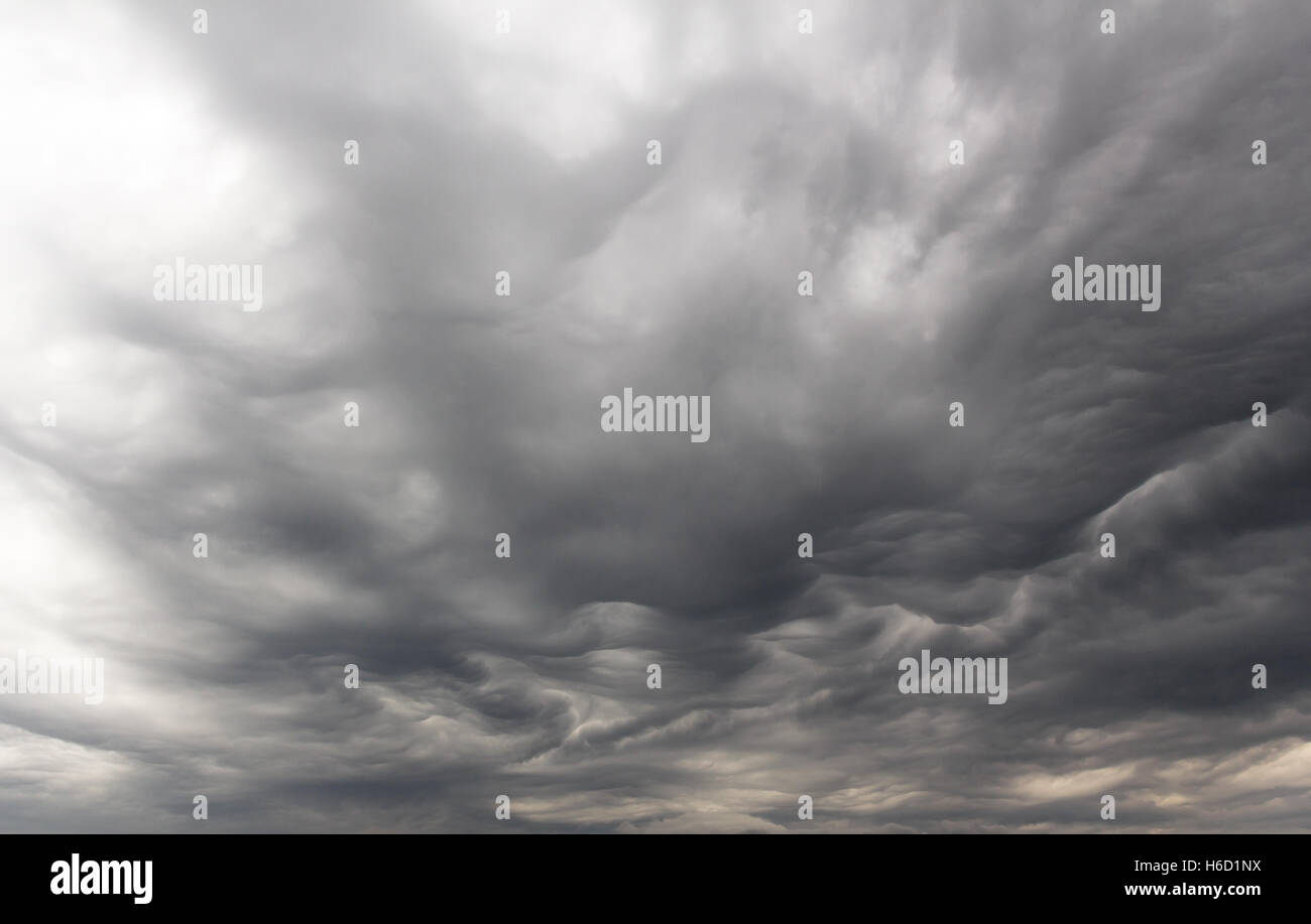 Dark ominous gray storm clouds. Dramatic sky Stock Photo - Alamy