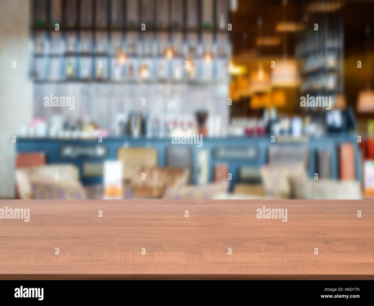 Wooden board empty table in front of blurred cafe Stock Photo - Alamy