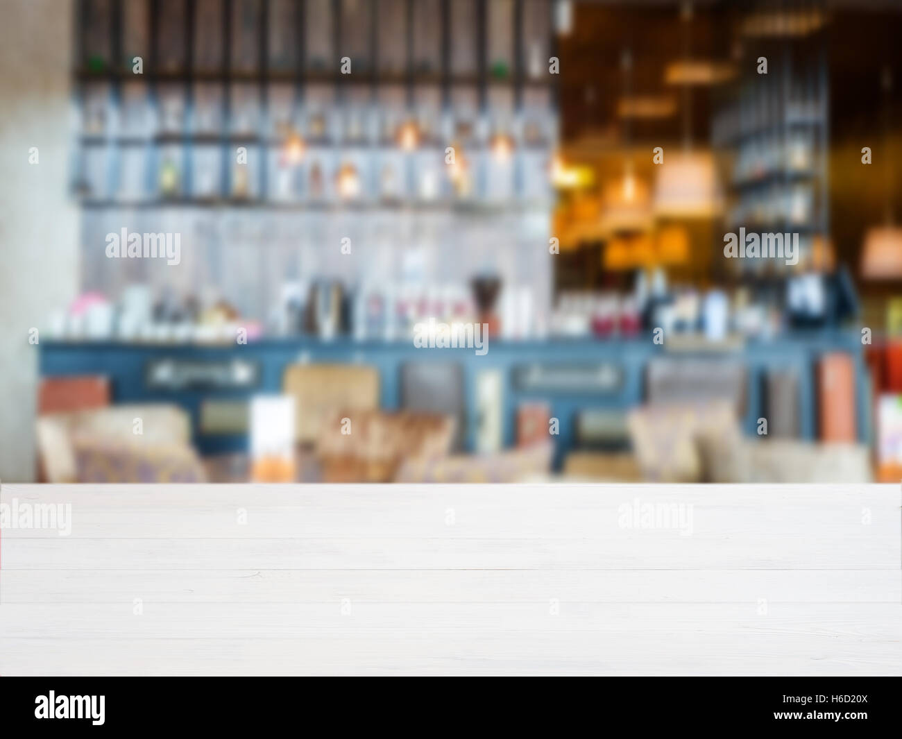 Wooden board empty table in front of blurred cafe Stock Photo - Alamy
