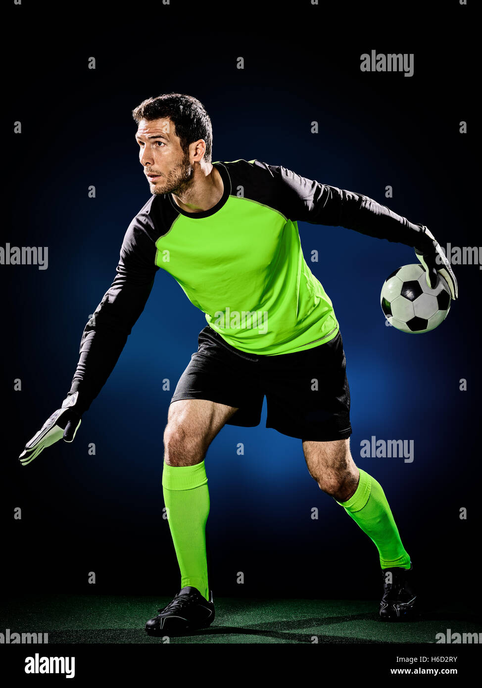 one caucasian goalkeeper soccer man isolated on black background Stock ...