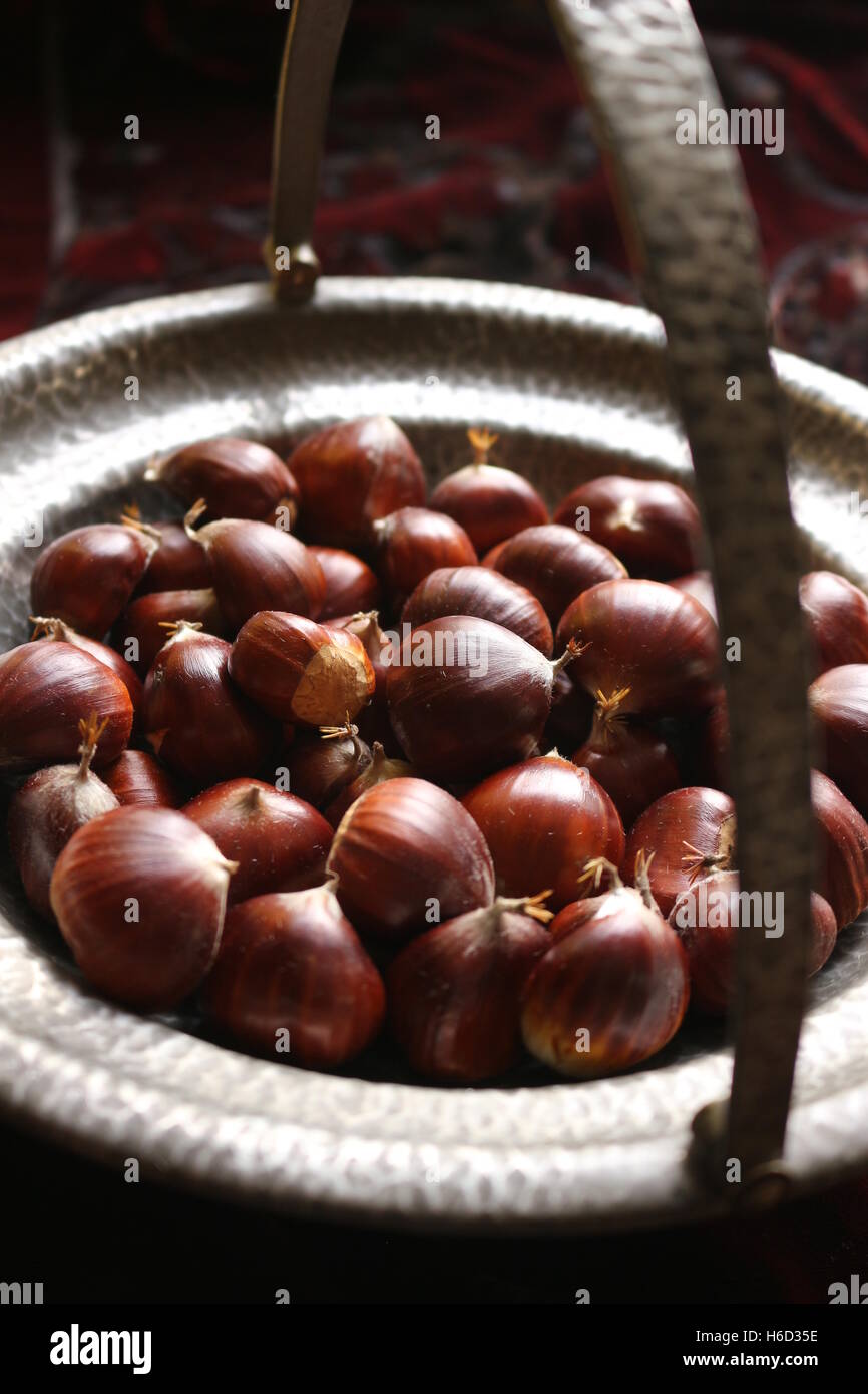 Chestnuts in a bowl Stock Photo - Alamy