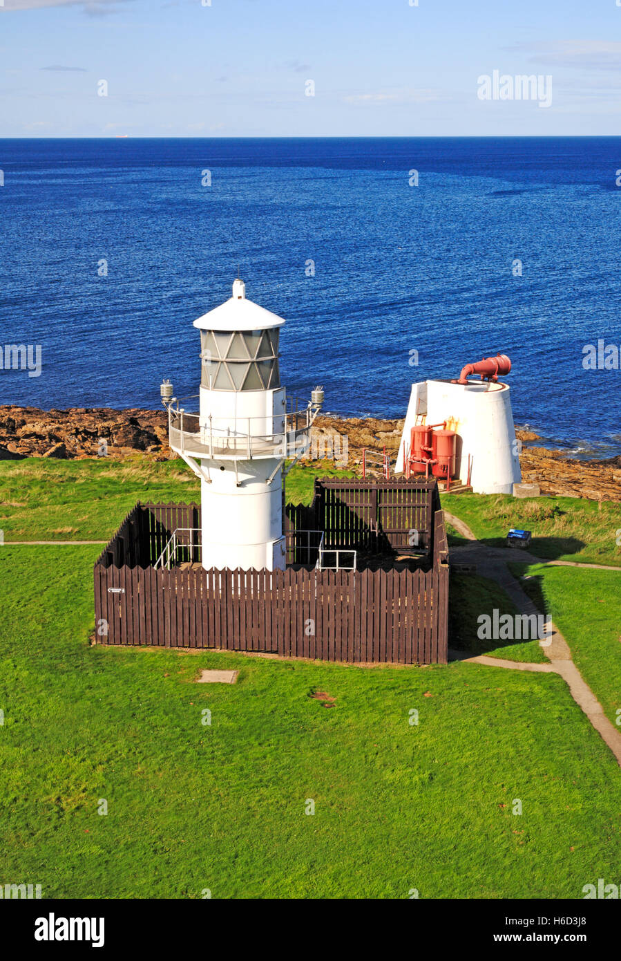 A view of the new lighthouse and old fog signal at Kinnaird Head ...