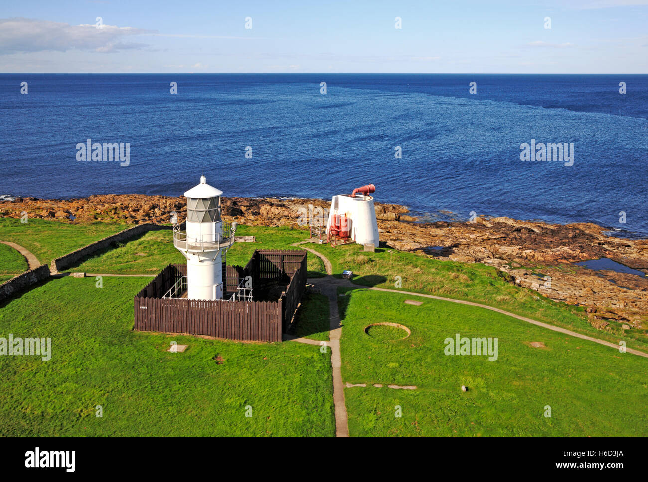 A view of the new lighthouse and old fog signal at Kinnaird Head ...