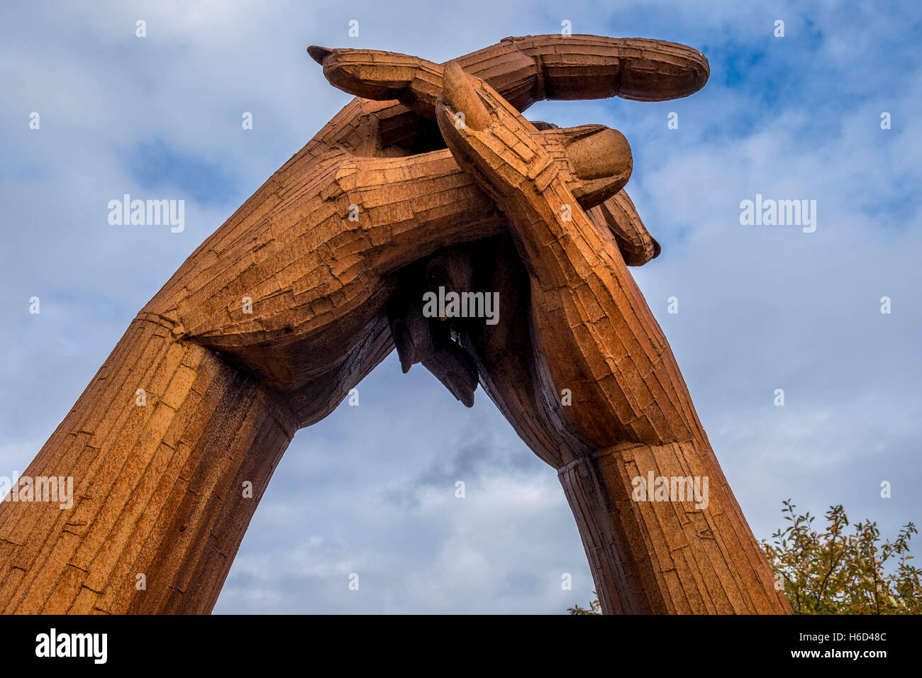 A pair of rusty metal hands in the entrance to Gretna Green Stock Photo ...