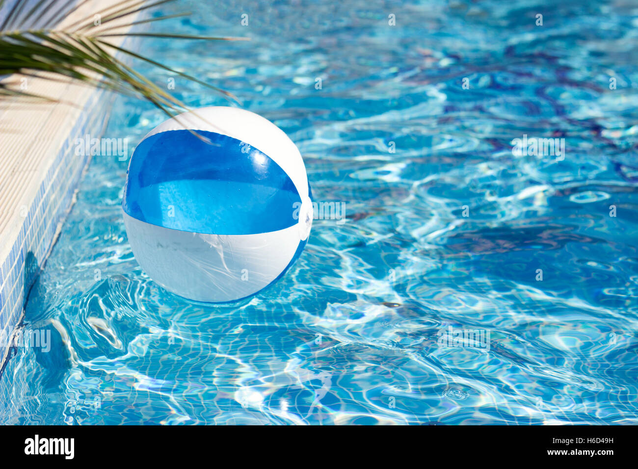 Ball in the pool Stock Photo - Alamy