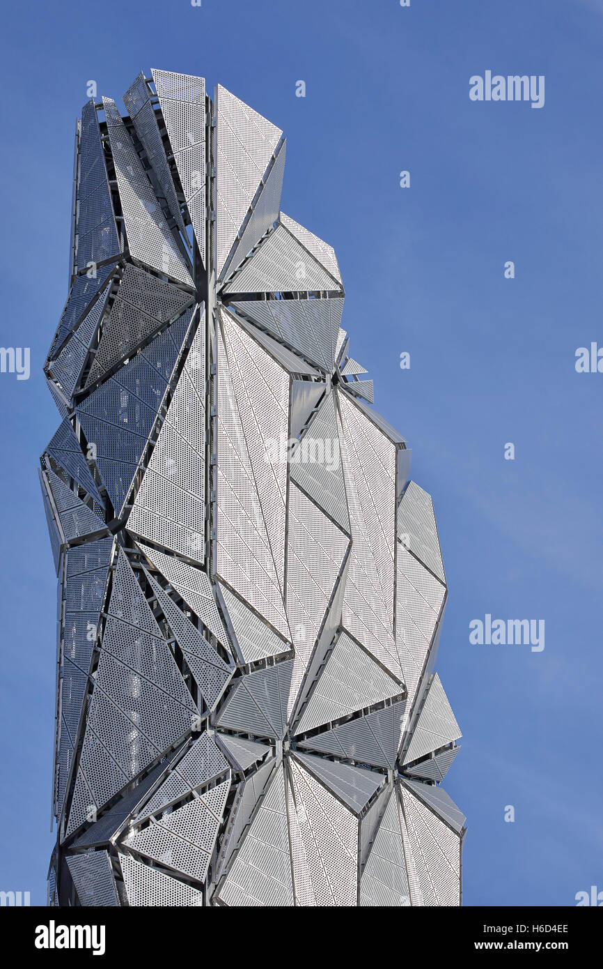 Close up view of the sculptural chimney with faceted abstract panels ...