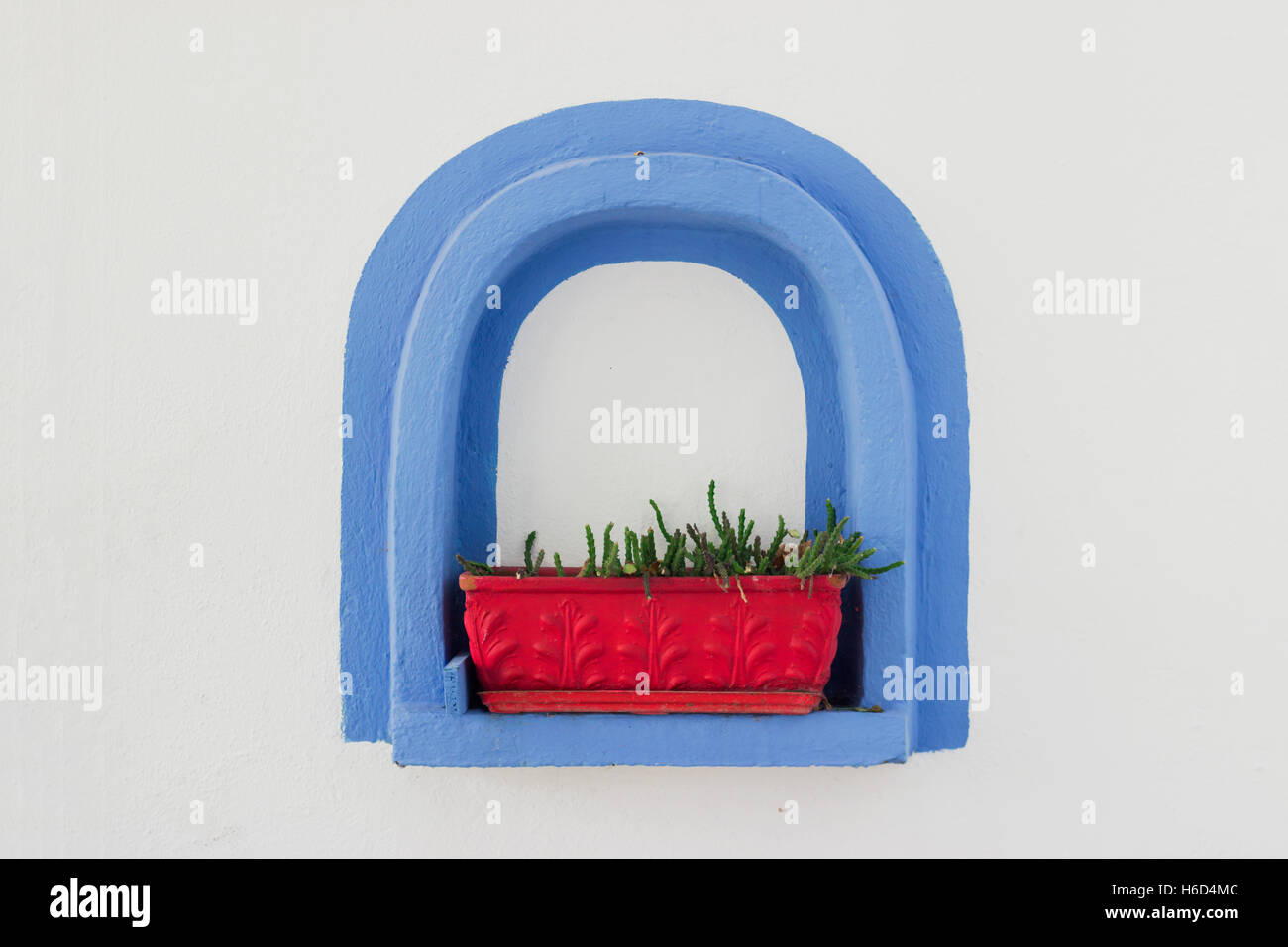 Blue decorative frame on the white wall Stock Photo - Alamy