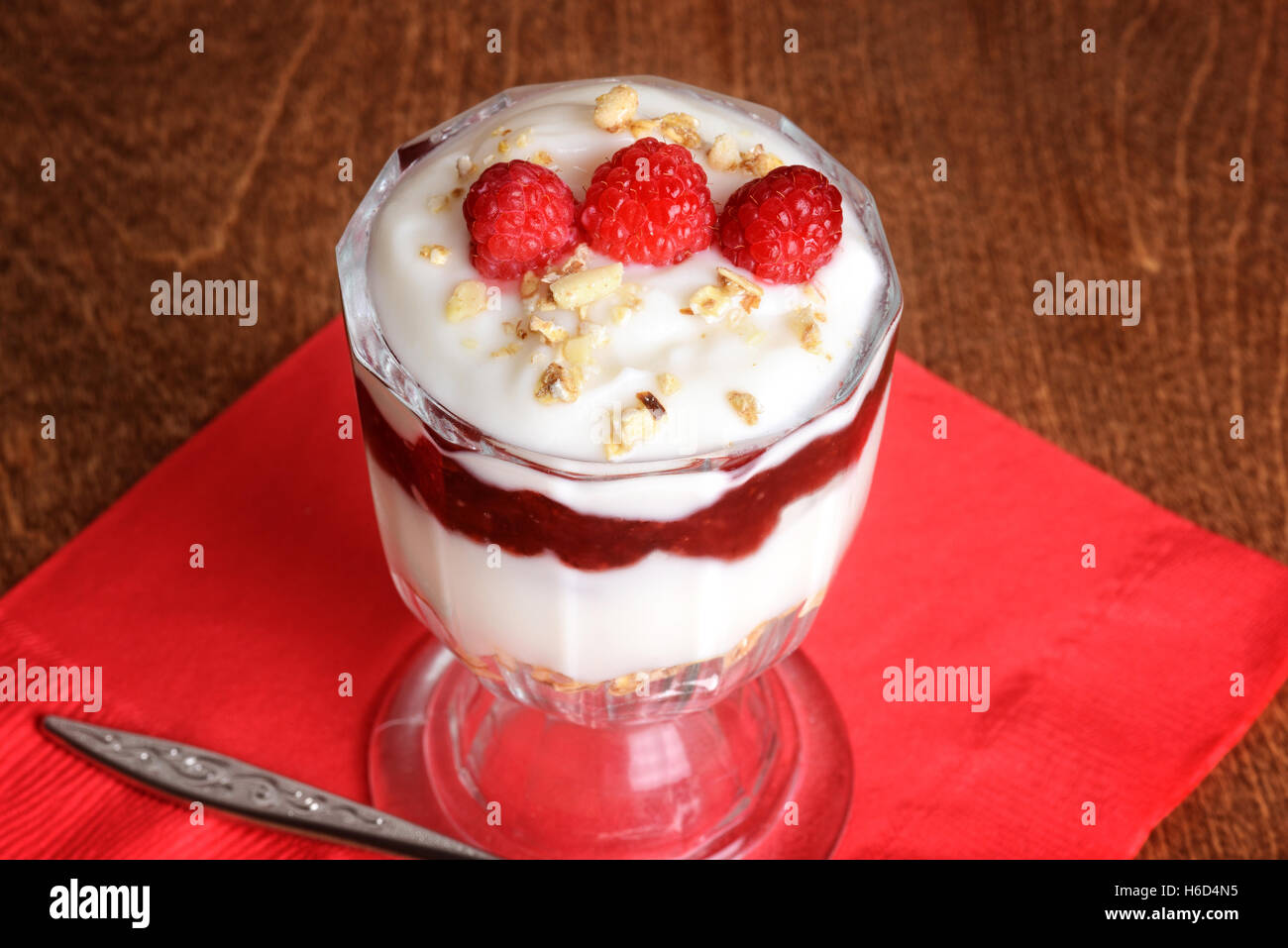 closeup raspberry parfait with granola Stock Photo - Alamy