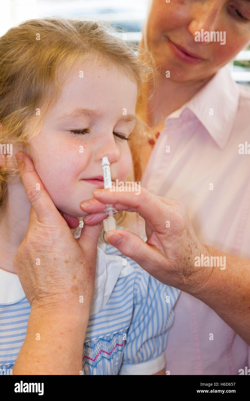 Child flu vaccine spray hi-res stock photography and images - Alamy