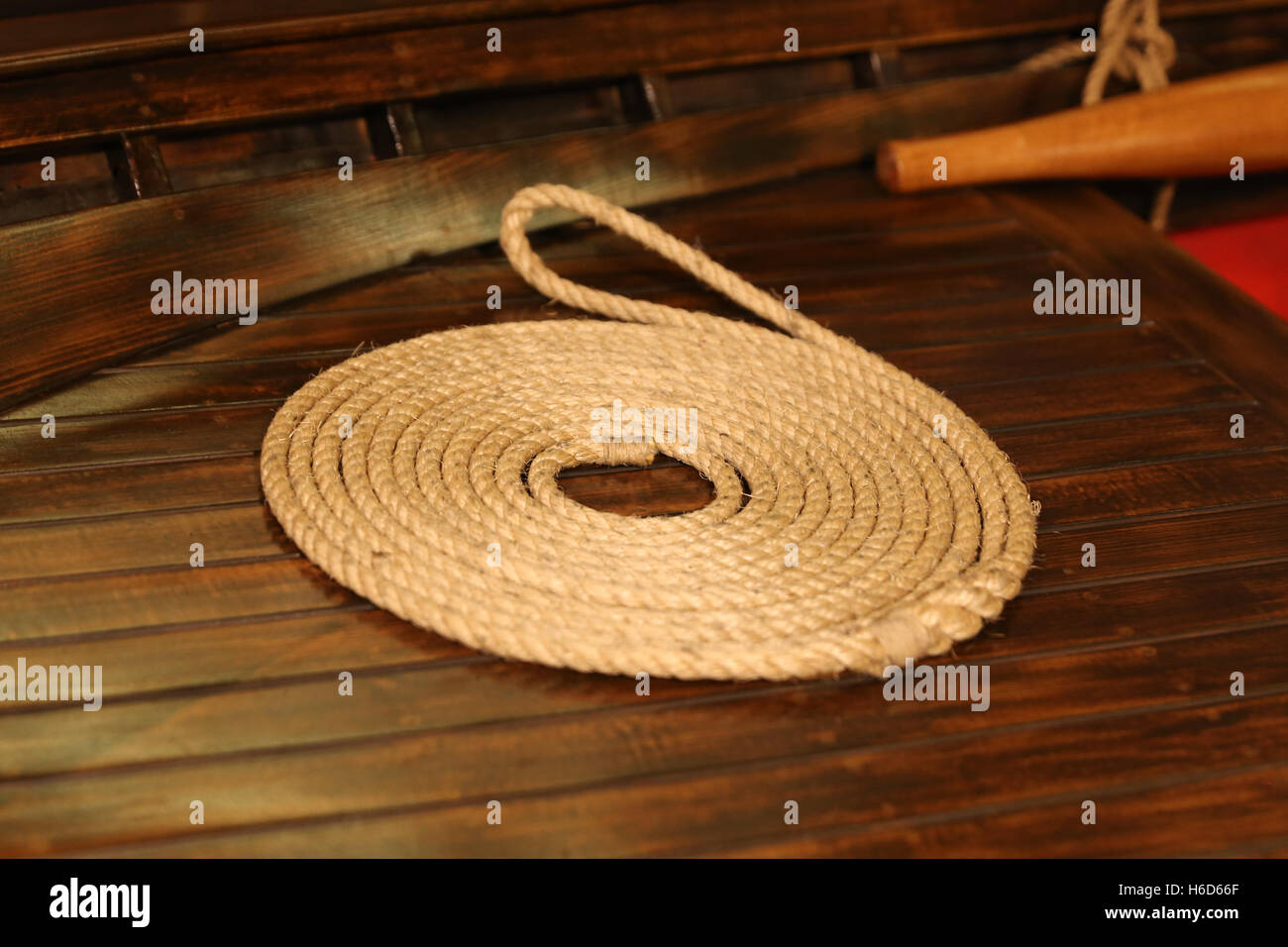 Rope and equipments of a wooden boat Stock Photo - Alamy
