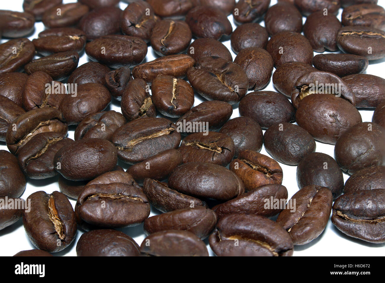 Arabica coffee beans for background Stock Photo - Alamy
