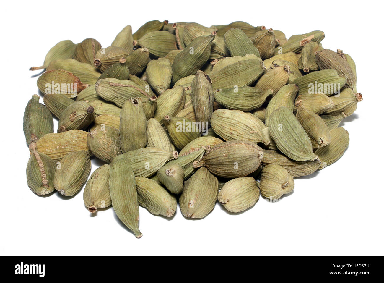 Group of cardamon pods with white background Stock Photo - Alamy