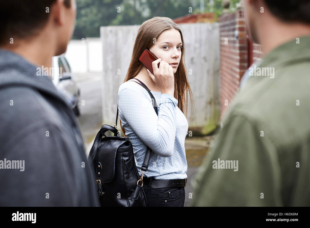 Teenage Girl Feeling Intimidated As She Walks Home Stock Photo - Alamy