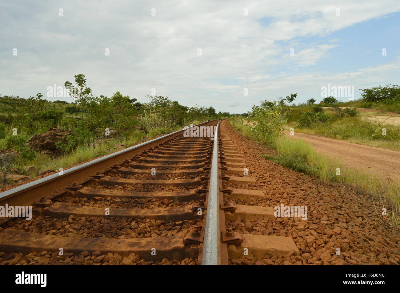 Landscape with a railroad train Stock Photo - Alamy