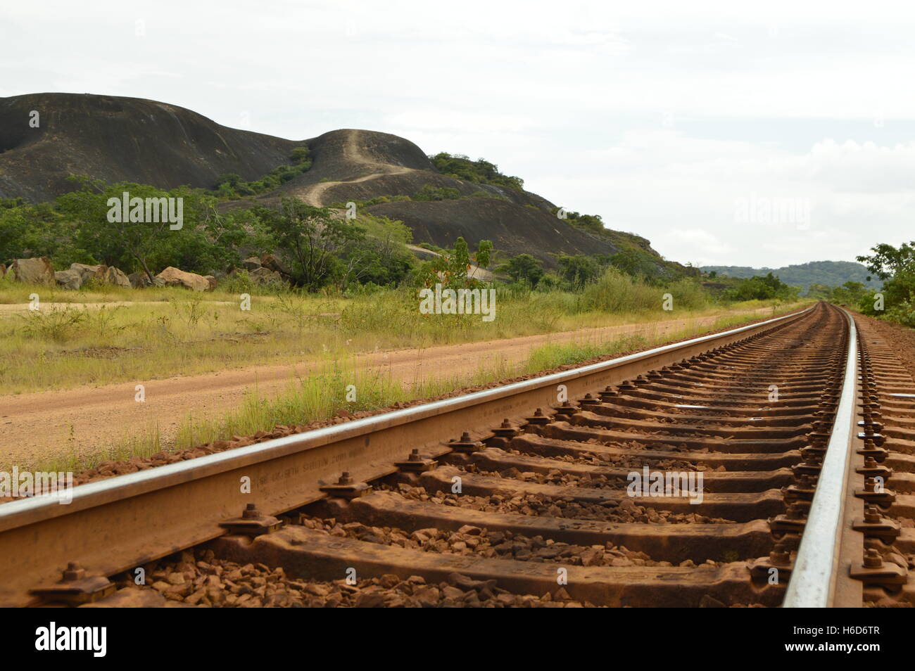 Landscape with a railroad train Stock Photo - Alamy