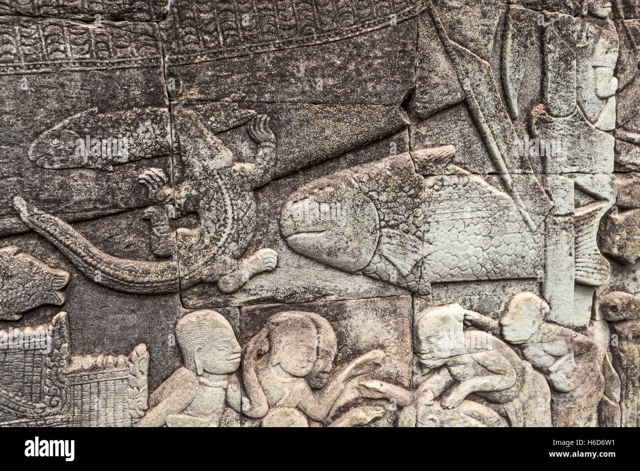 Crocodile with fish and Giant Barb, bas-relief, Bayon complex, temple ...