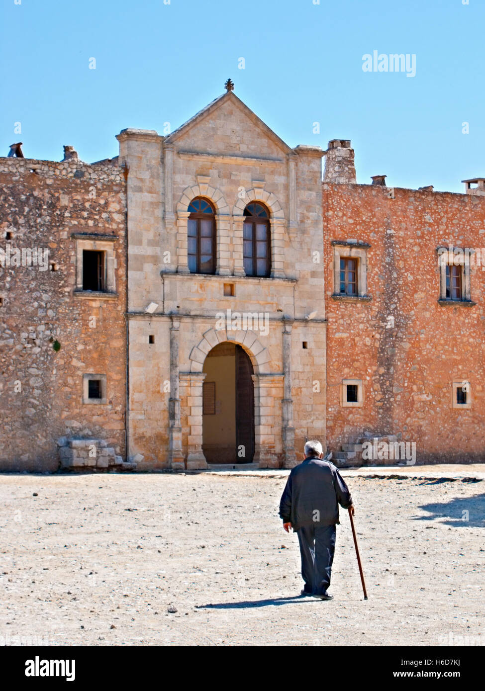 The old man with a cane goes to the entrance (Western Door) of Arkadi ...