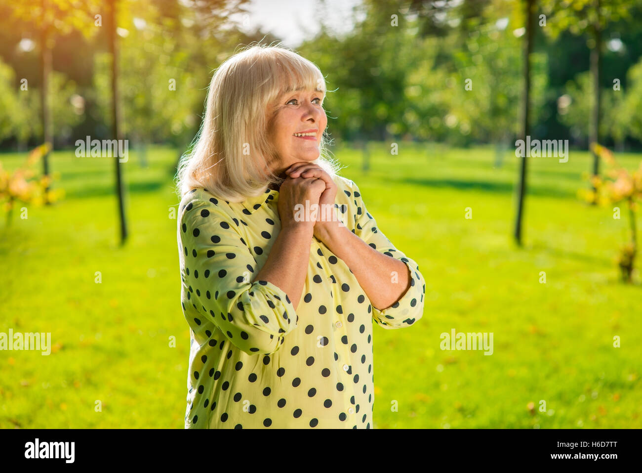 Hand on chest woman happy hi-res stock photography and images - Alamy
