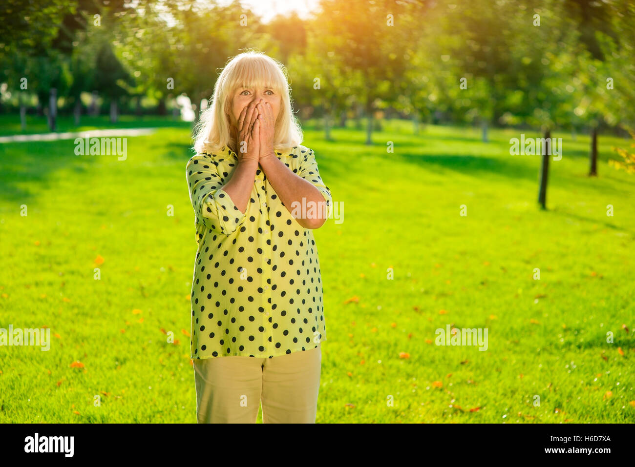 Senior woman is scared Stock Photo - Alamy