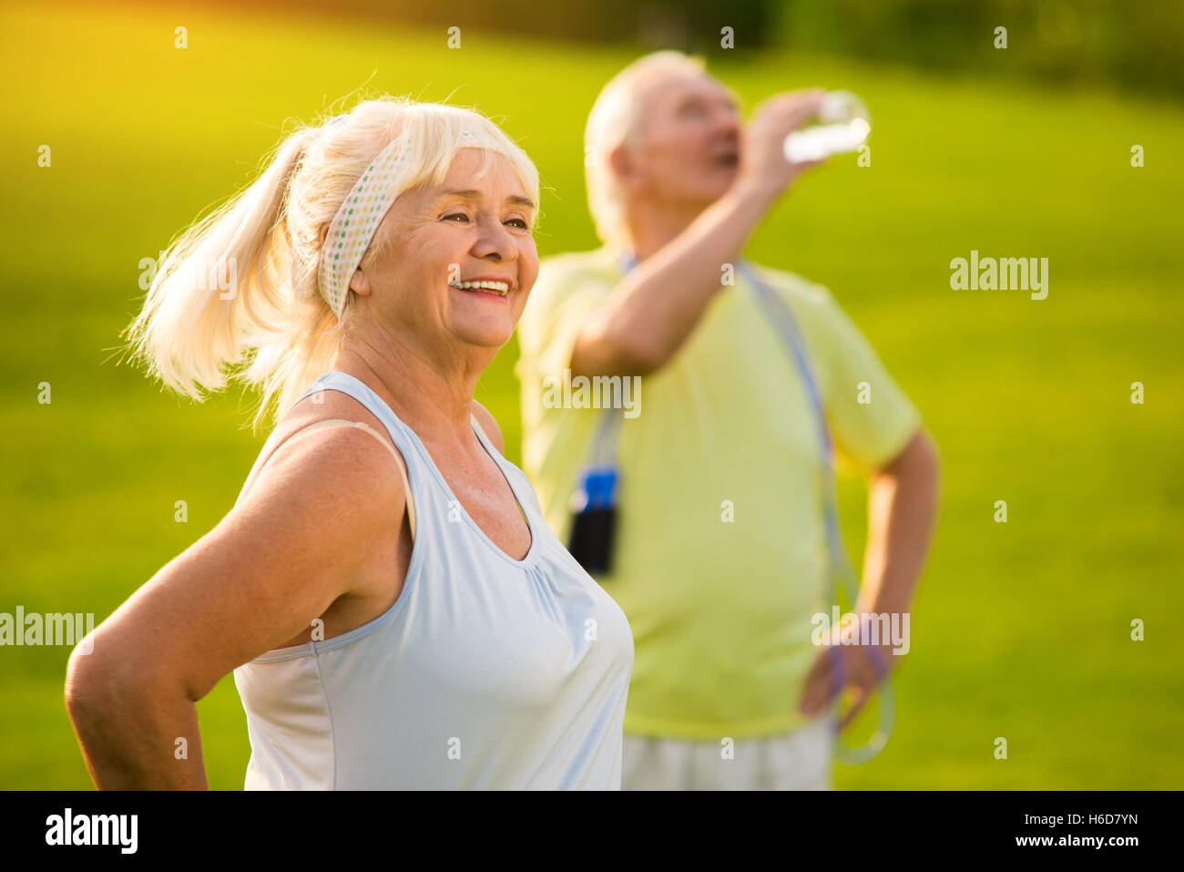 Senior woman smiling outdoors Stock Photo - Alamy