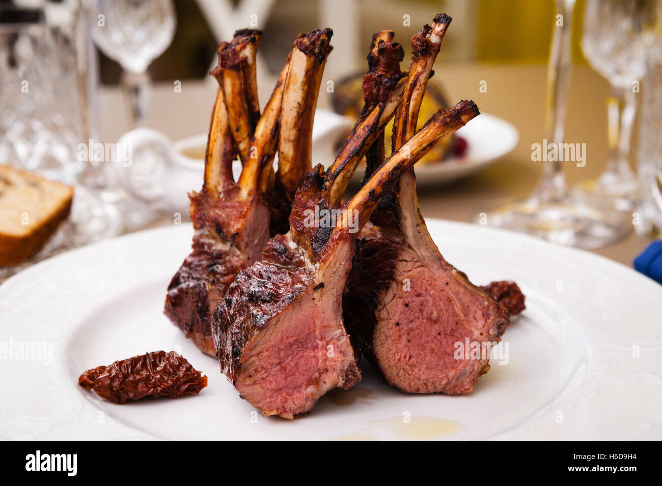 Lamb rack on a plate Stock Photo - Alamy