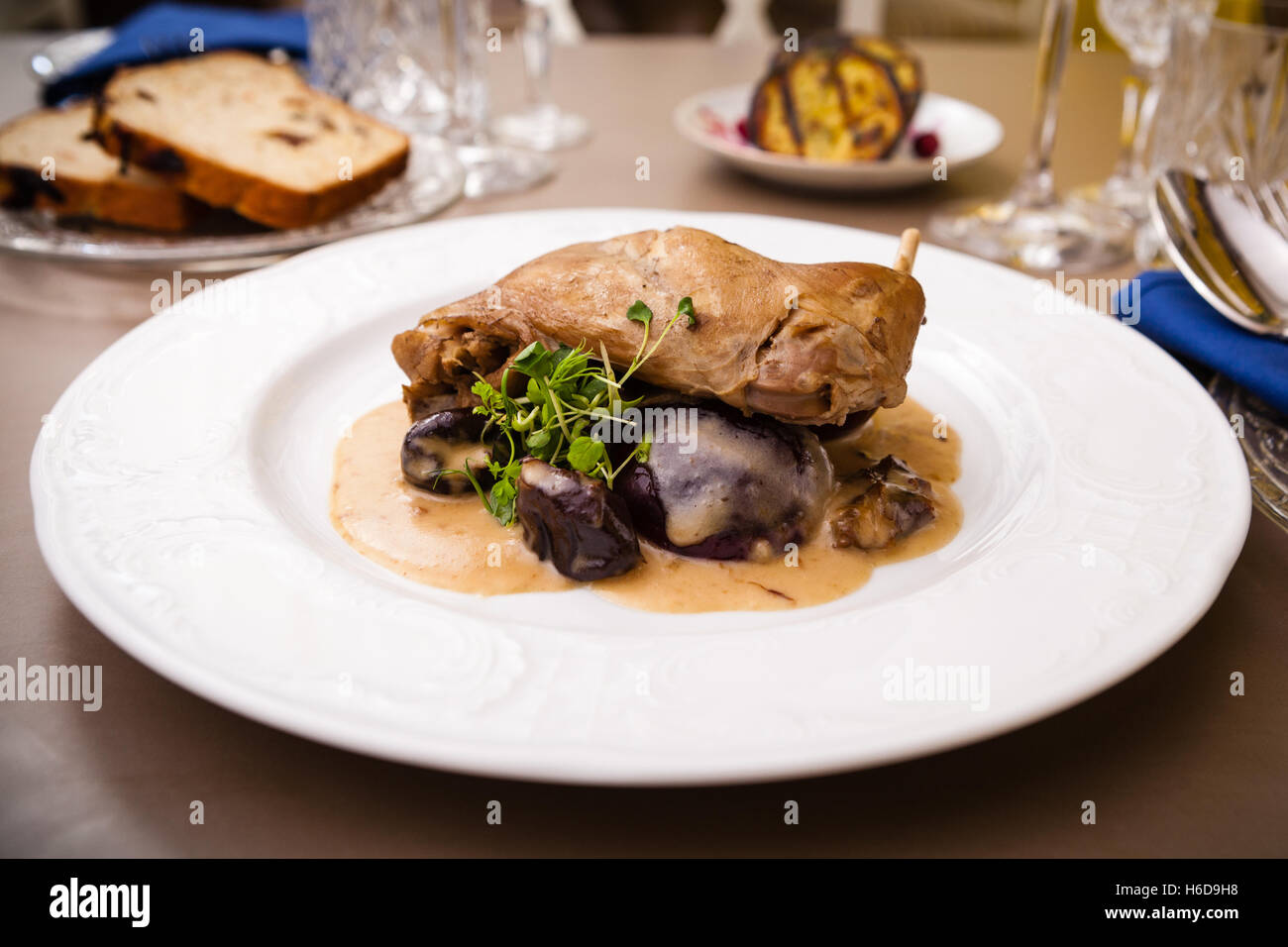 Stewed rabbit leg Stock Photo - Alamy