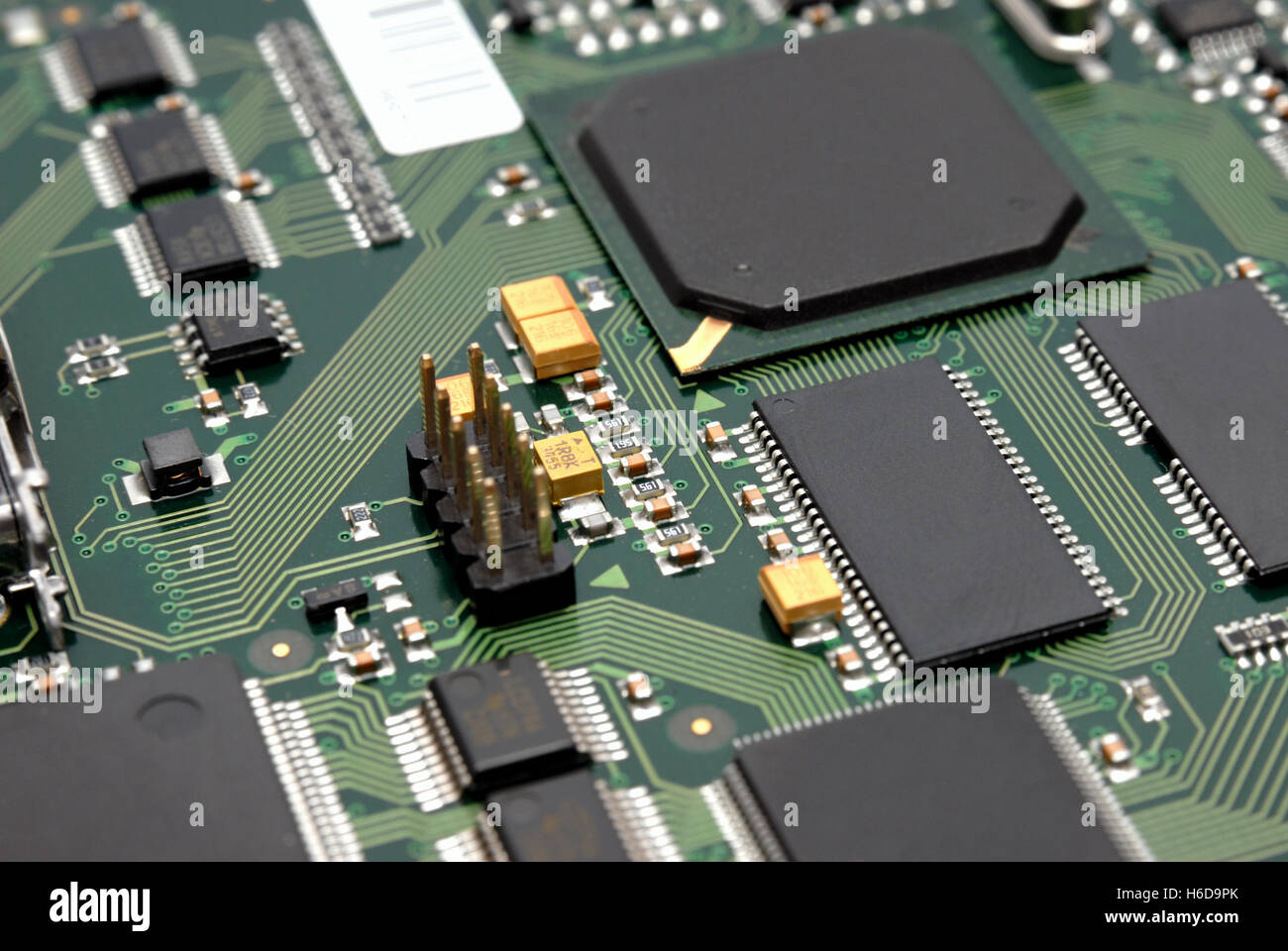 The printed-circuit-board with computer chips resistors and condensers ...