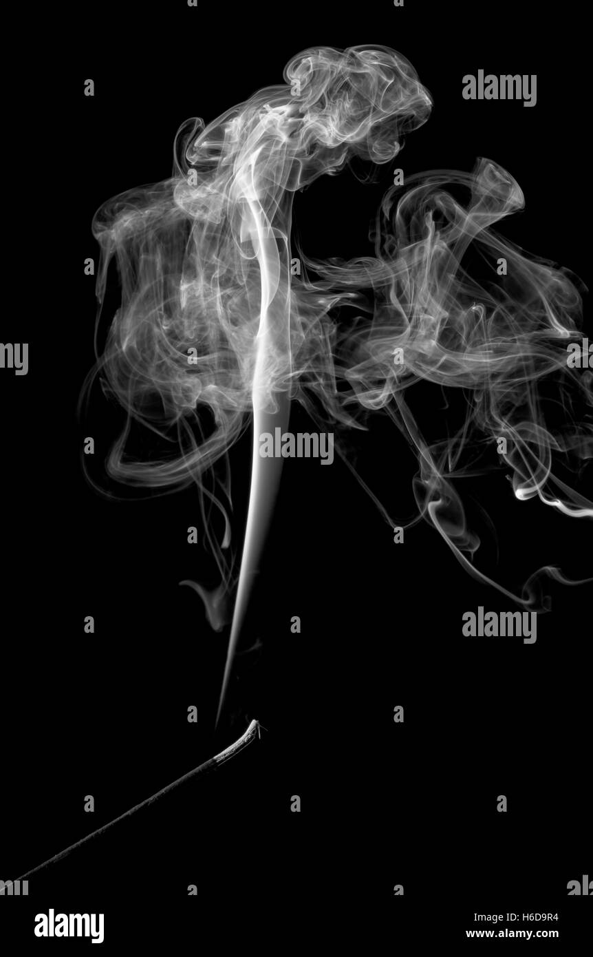 Abstract light smoke on a dark background Stock Photo - Alamy