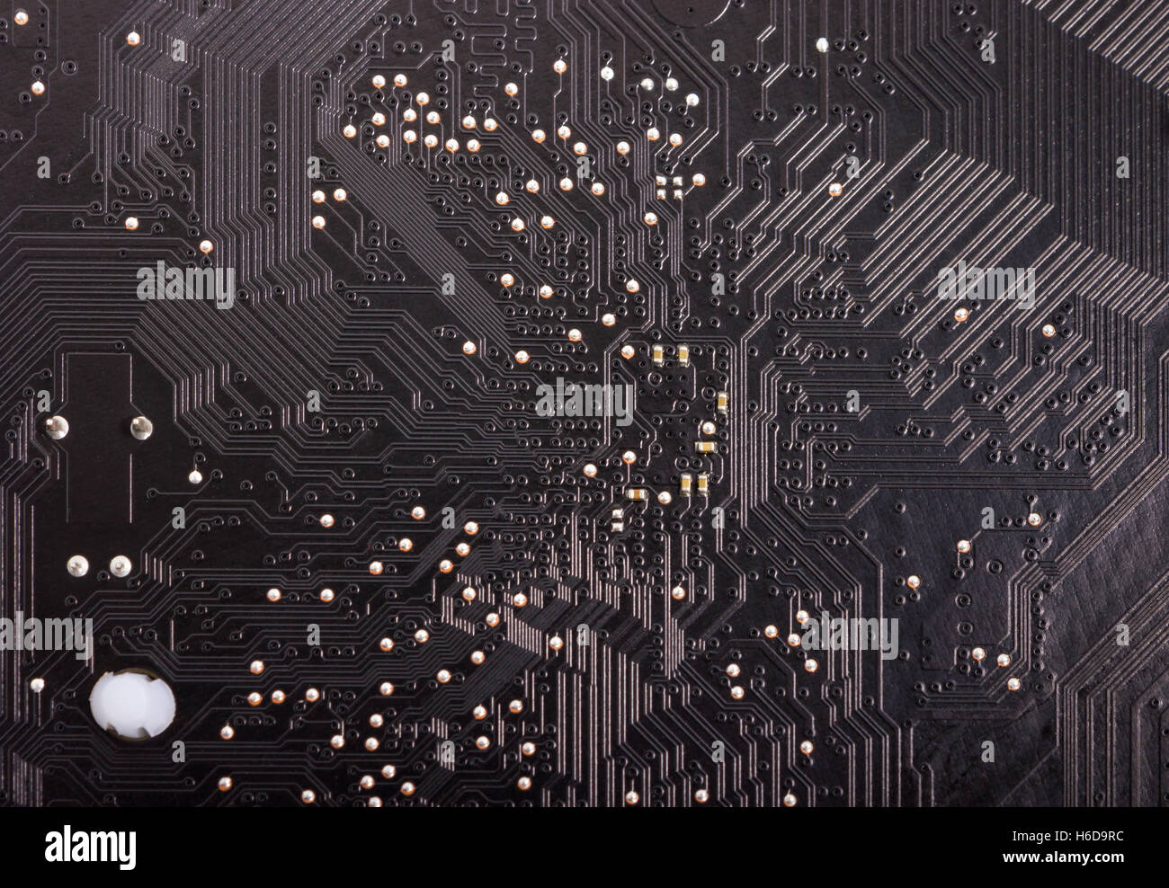 Close up shot of the backside computer mainboard Stock Photo - Alamy