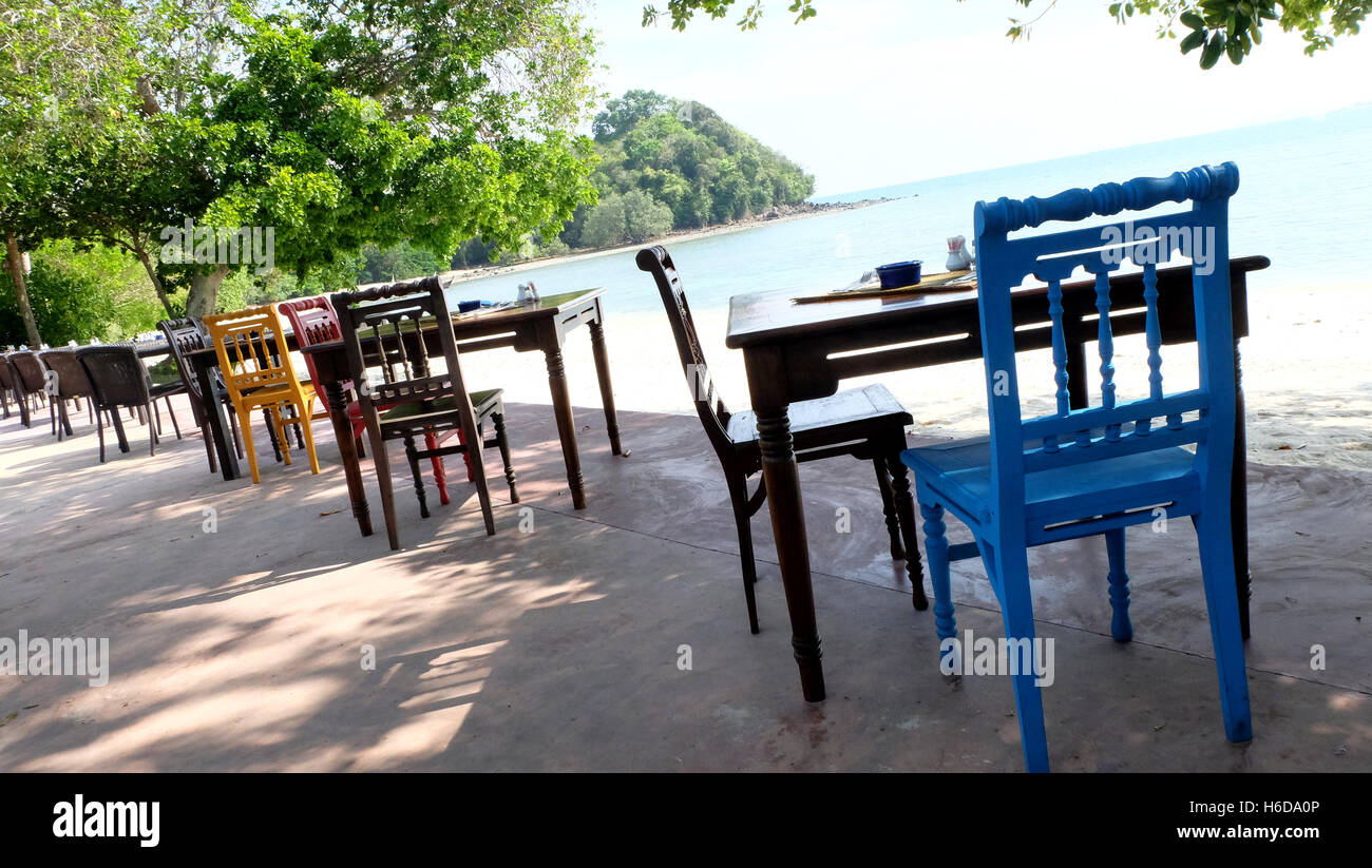 The resort restaurant outdoor furniture wood table Stock Photo - Alamy