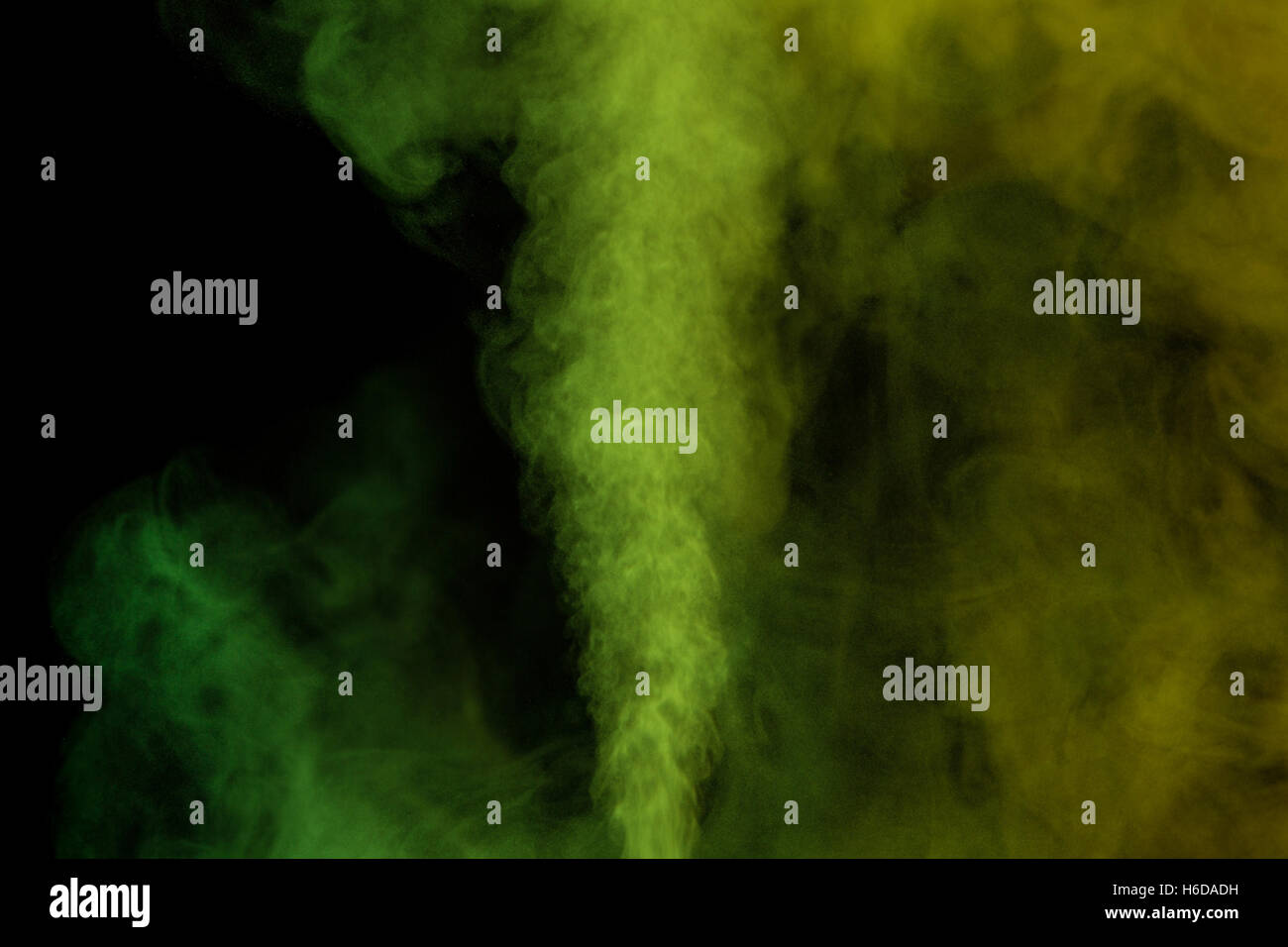 Abstract green yellow water vapor on a black background. Texture ...