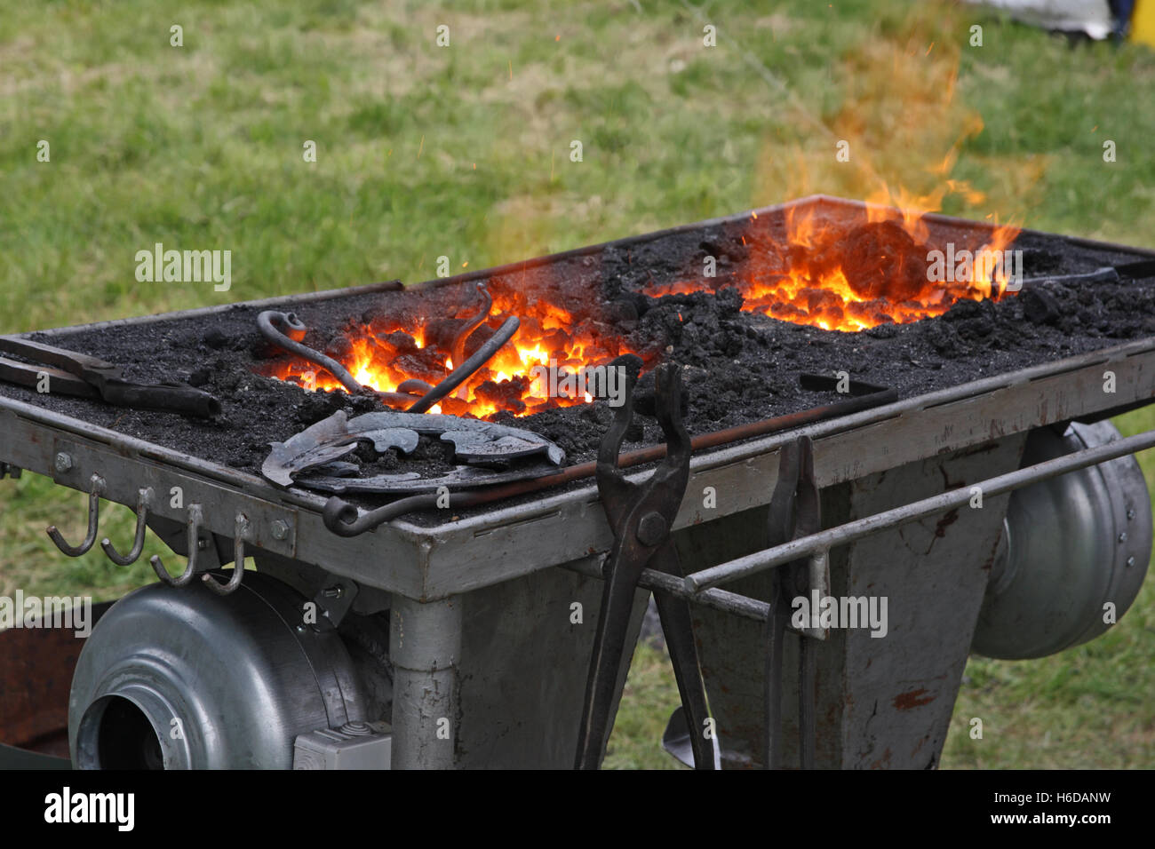 Forge with hot flaring coal Stock Photo - Alamy