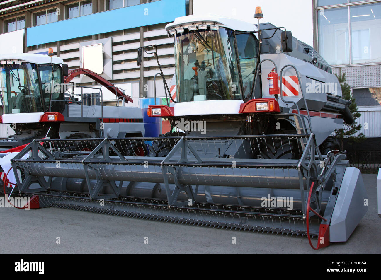 Grey modern combine at the exhibition centre Stock Photo - Alamy