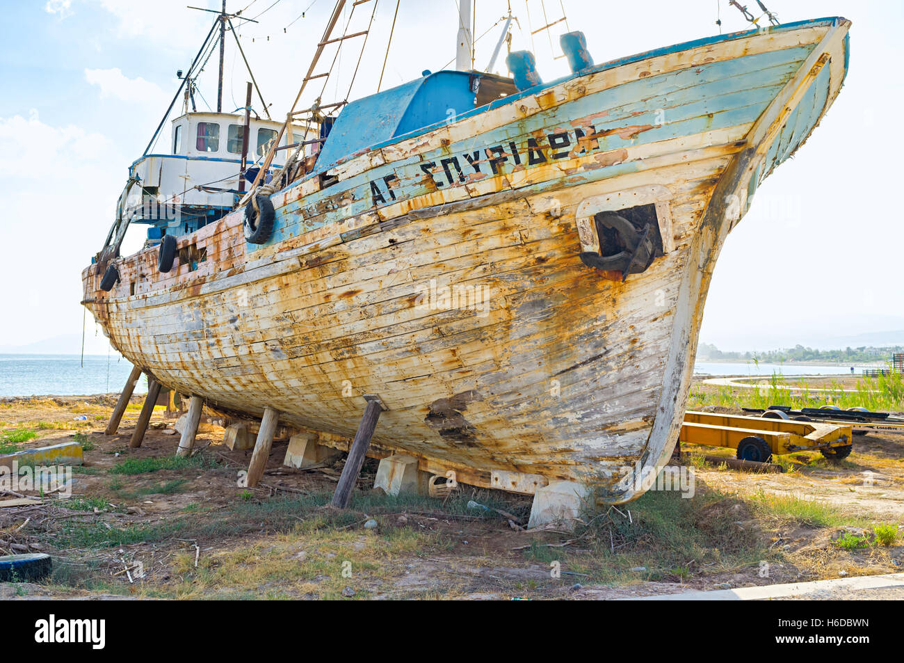 The old fishing ship stands on the seashore as the symbol of the famous ...