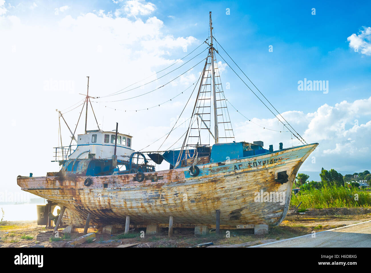 The old fishing ship stands on the seashore as the symbol of the famous ...