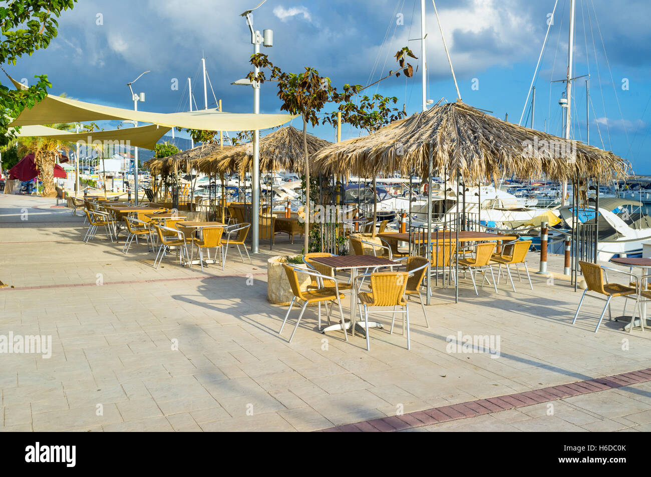 The outdoor restaurant in the traditional Cypriot village of Latchi ...
