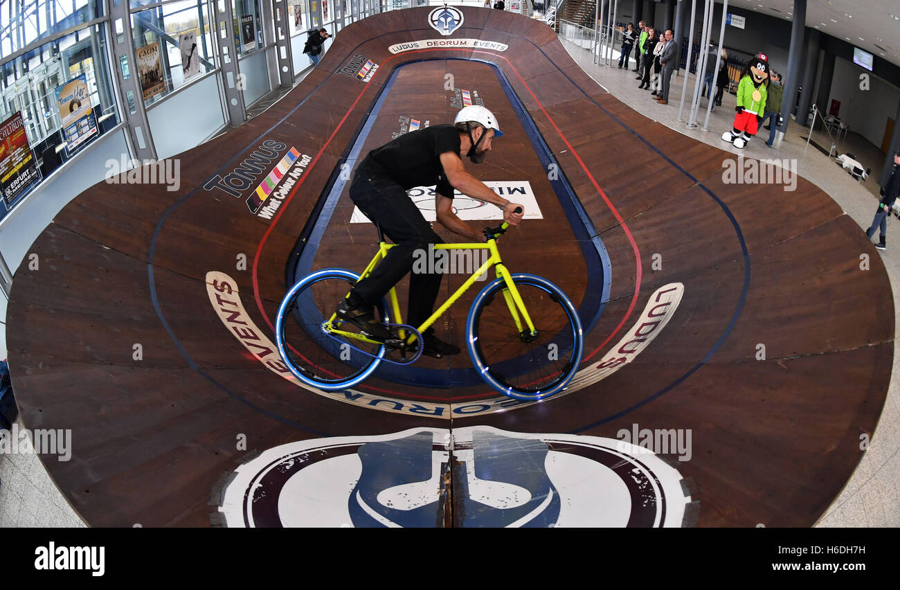 Former race cyclist Andreas Bach in action in a portable minidrome ...