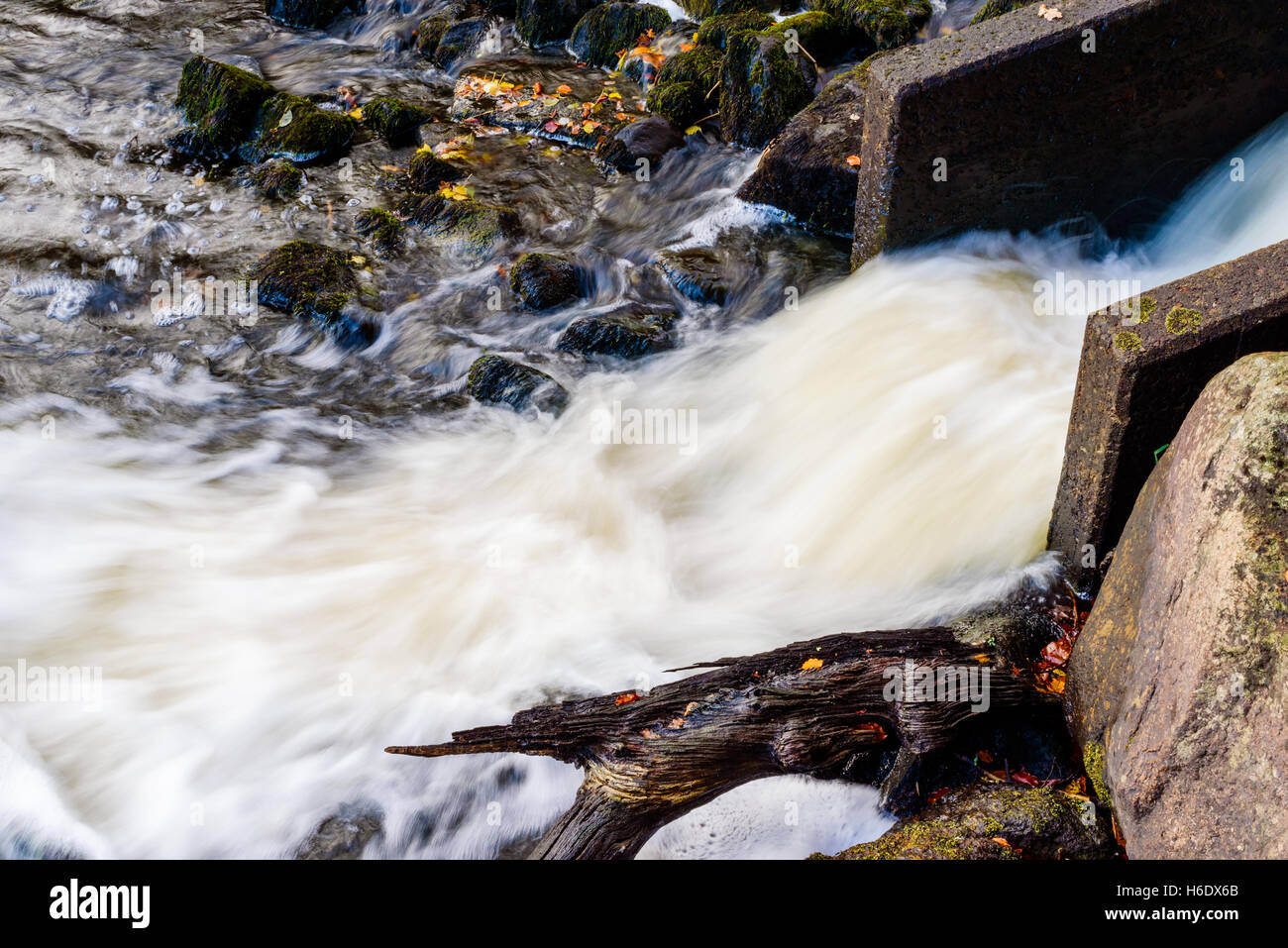 Water flowing out at the lower part of a narrow fish ladder Stock Photo ...