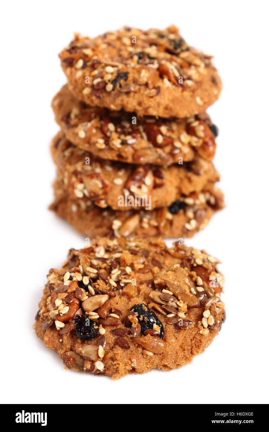 Stack of Multi seed cookies. Isolated on white background Stock Photo ...