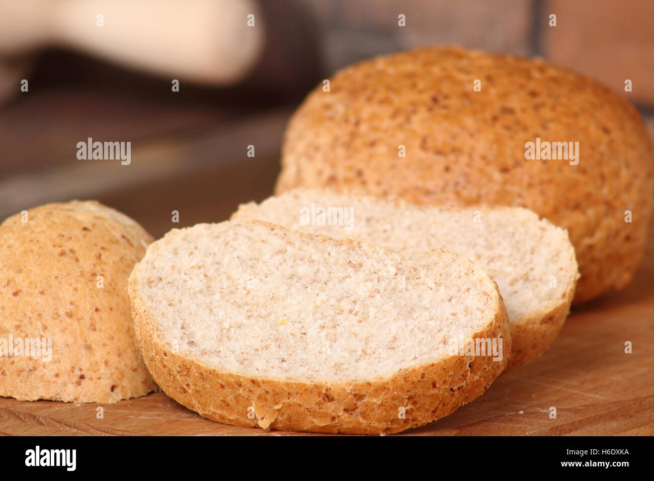 Sliced Graham bread roll Stock Photo - Alamy