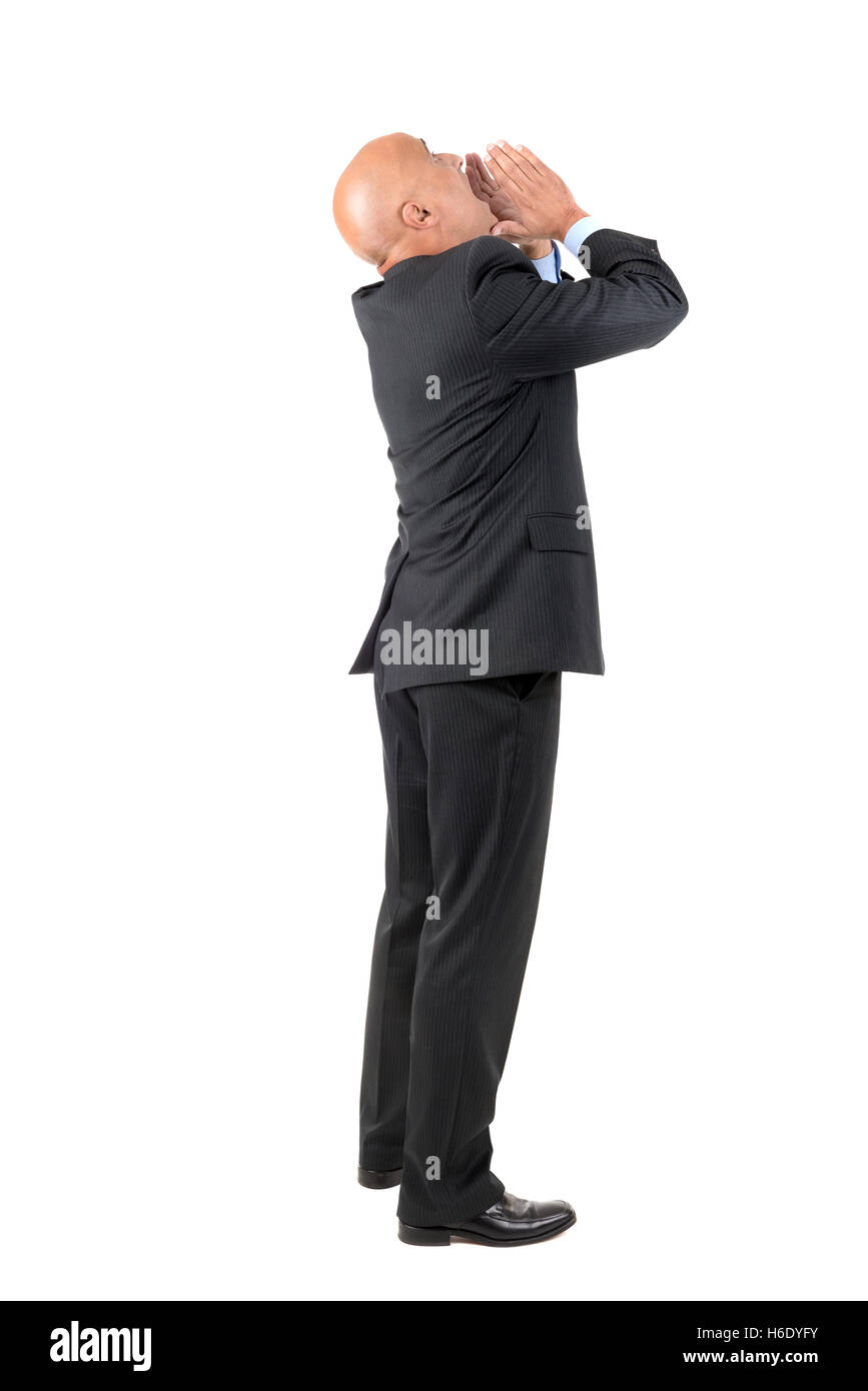 Businessman shouting isolated against a white background Stock Photo ...