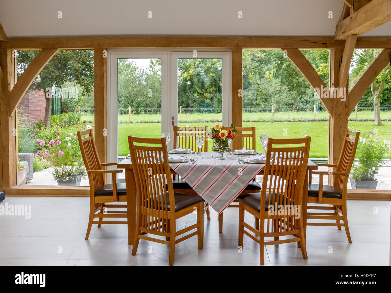 Rear of house green oak extension Stock Photo - Alamy