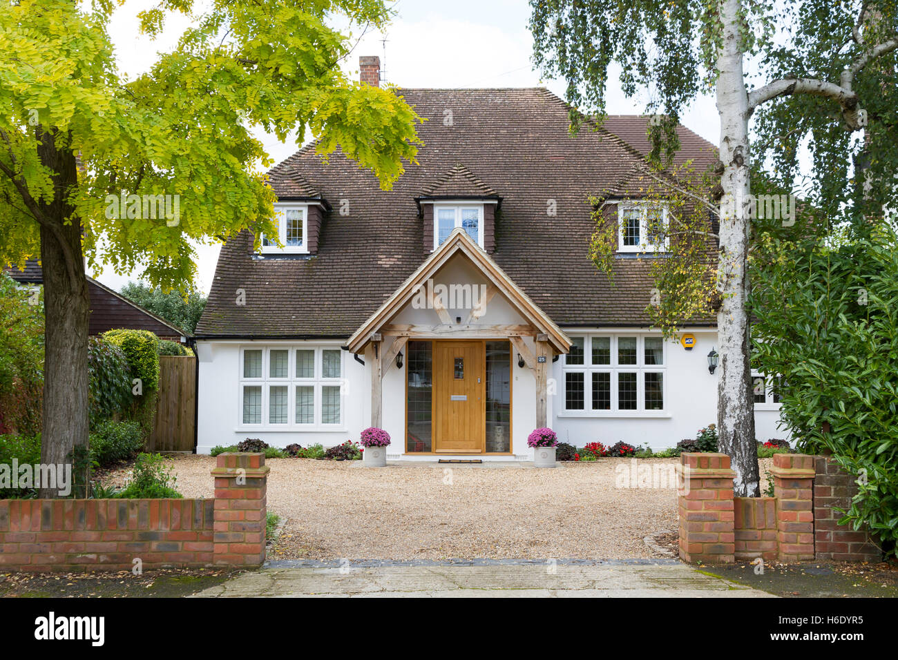 Rear of house green oak extension Stock Photo - Alamy