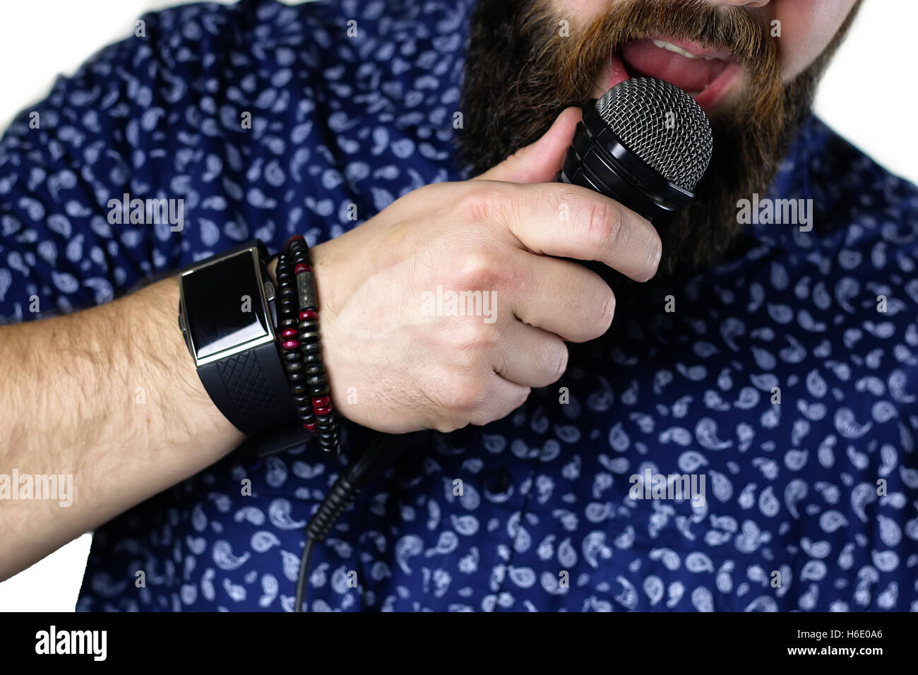 microphone on stage hand hold Stock Photo - Alamy