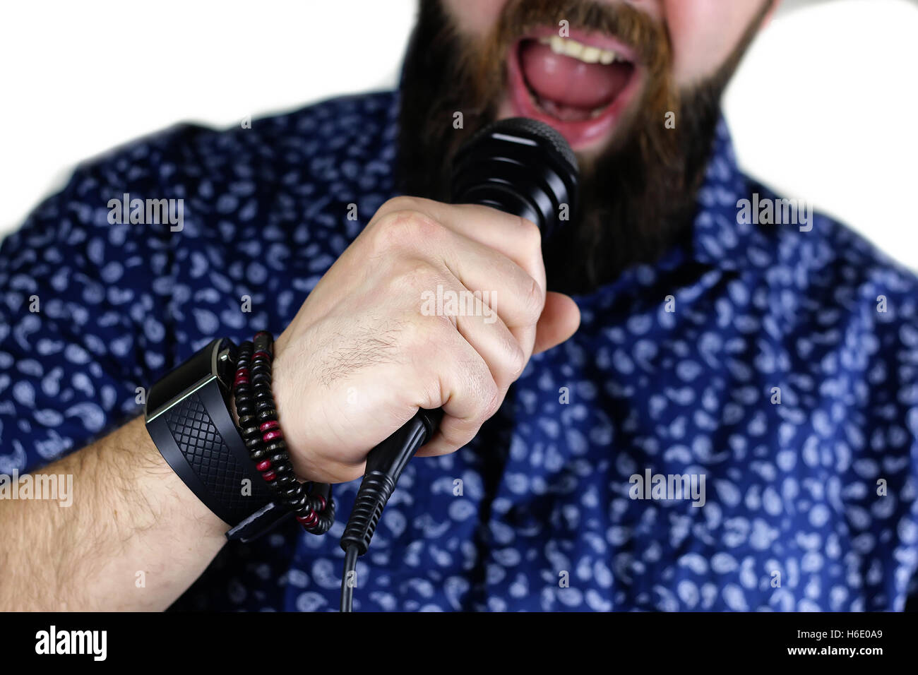 microphone on stage hand hold Stock Photo - Alamy