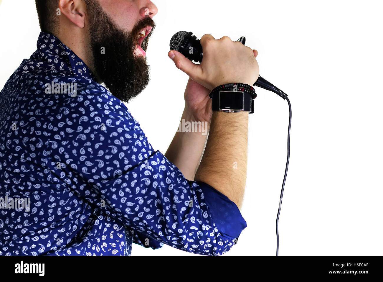 microphone on stage hand hold Stock Photo - Alamy