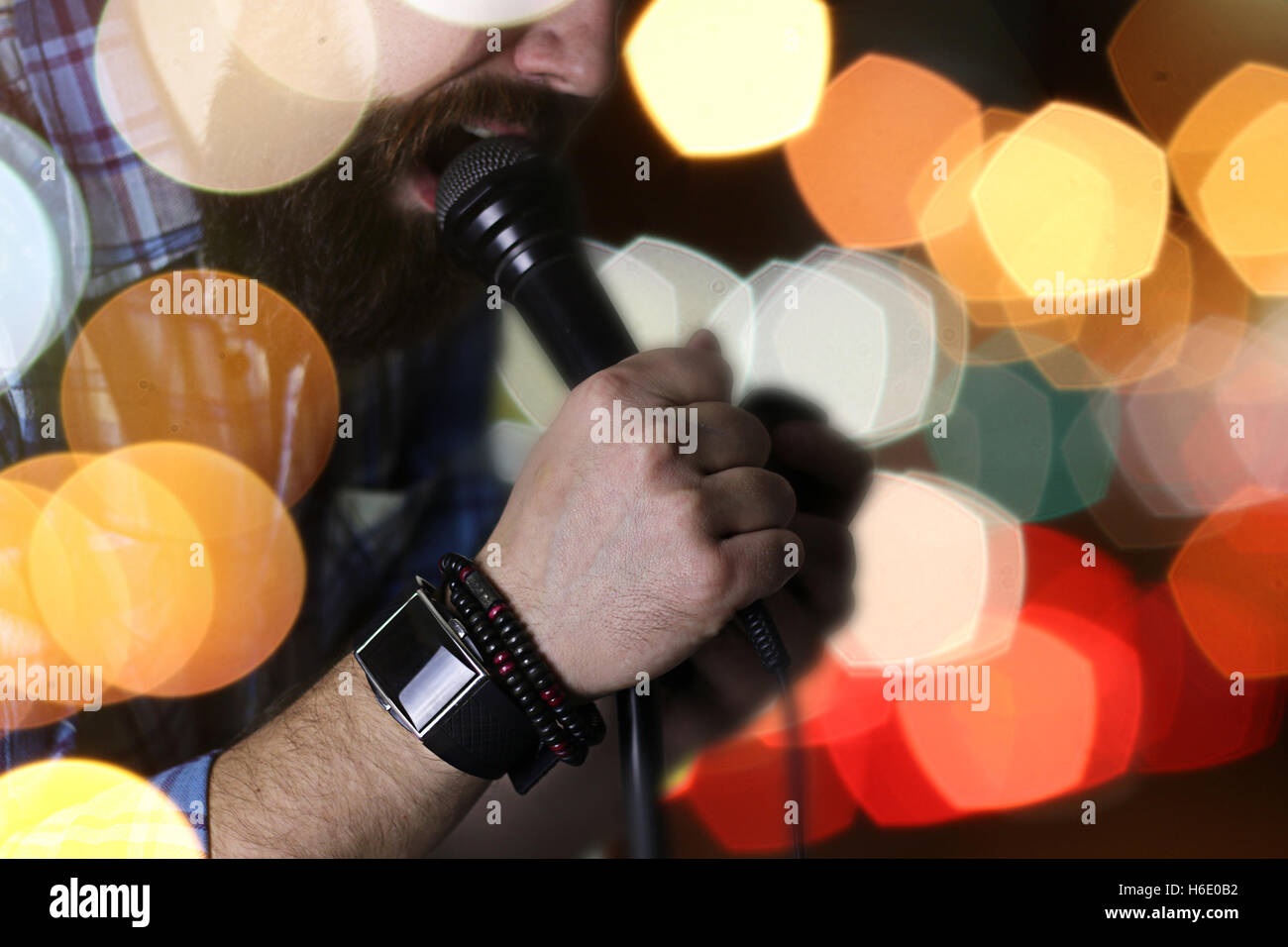 singer singing stage light Stock Photo - Alamy