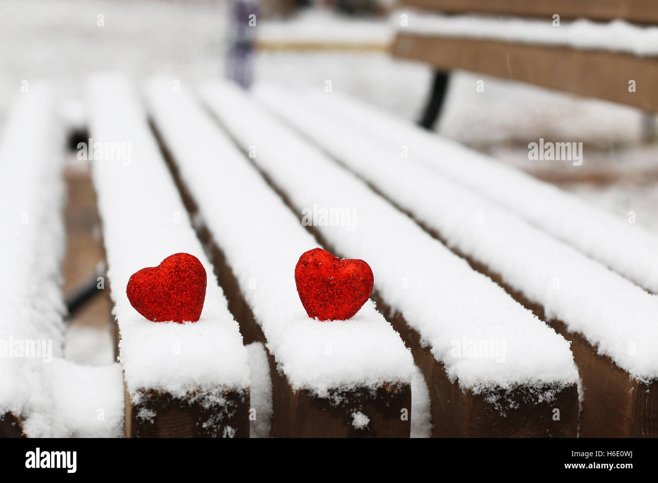 Snow hearts red winter two Stock Photo - Alamy